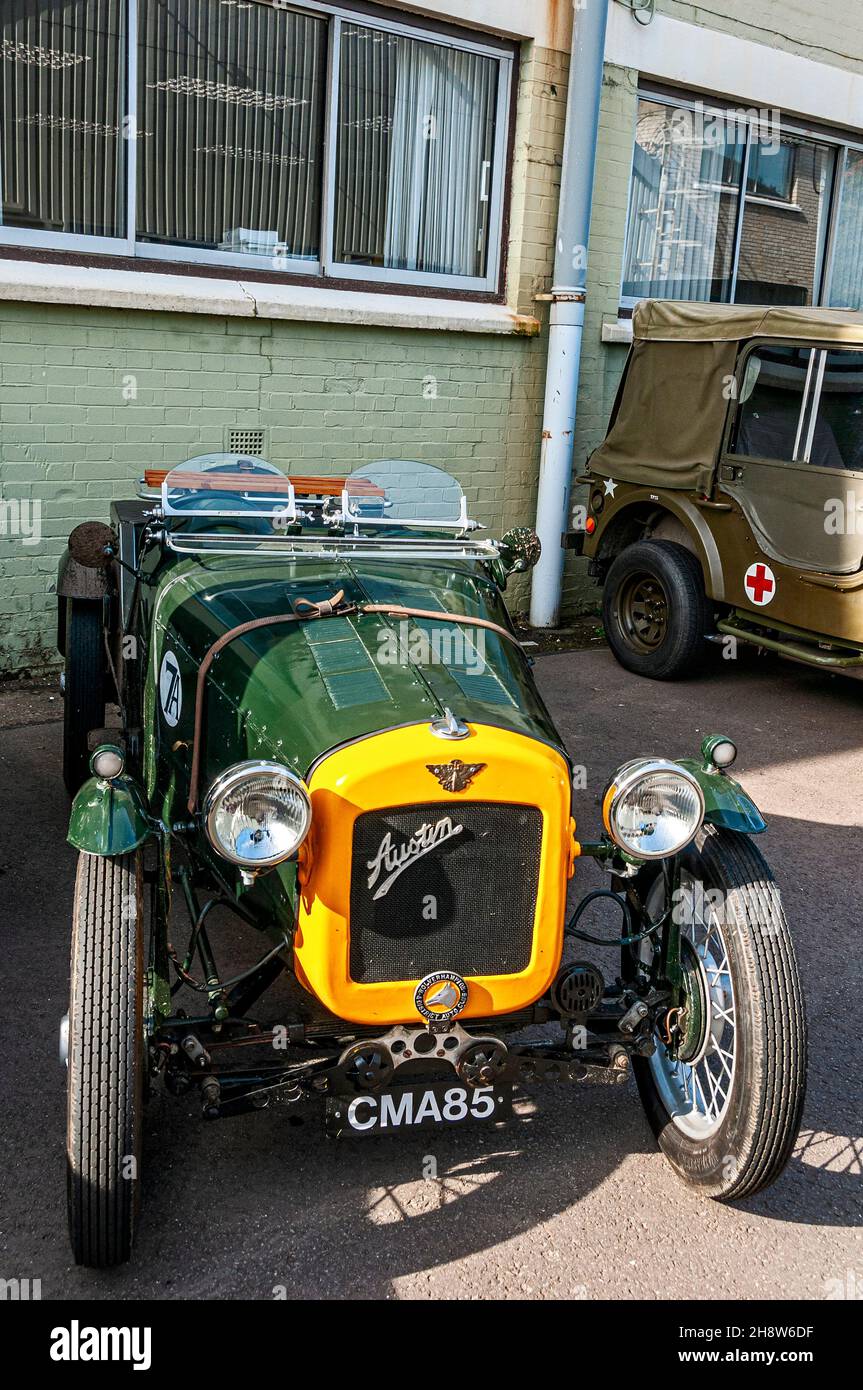 A restored 1935 Austin 7 two-seater sports car parked outside the ...