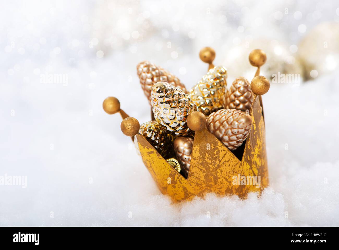 Golden crown with pine cones Stock Photo - Alamy
