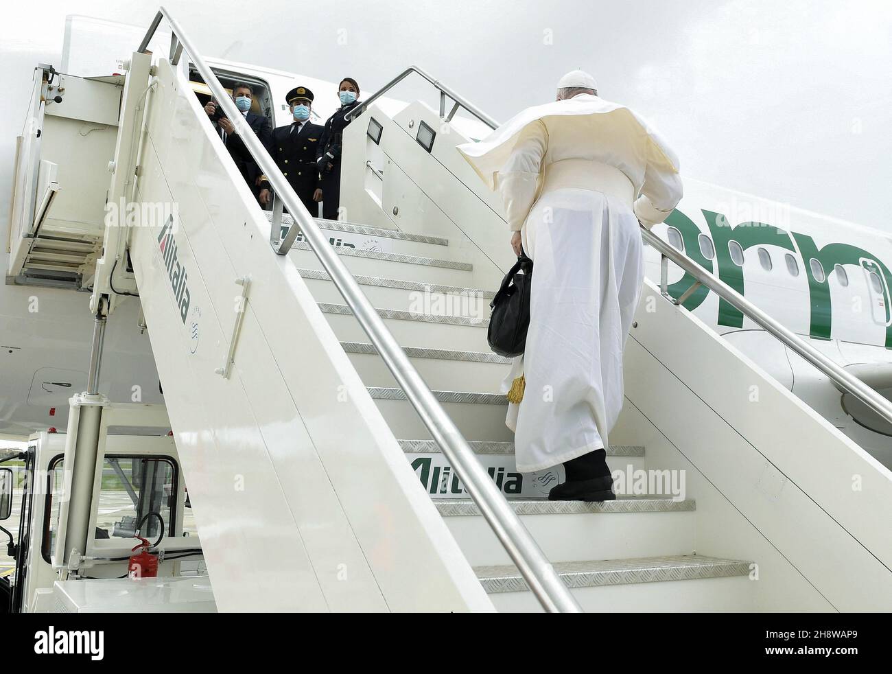 Pope Francis boards a plane on December 02, 2021 at Rome s Fiumicino ...