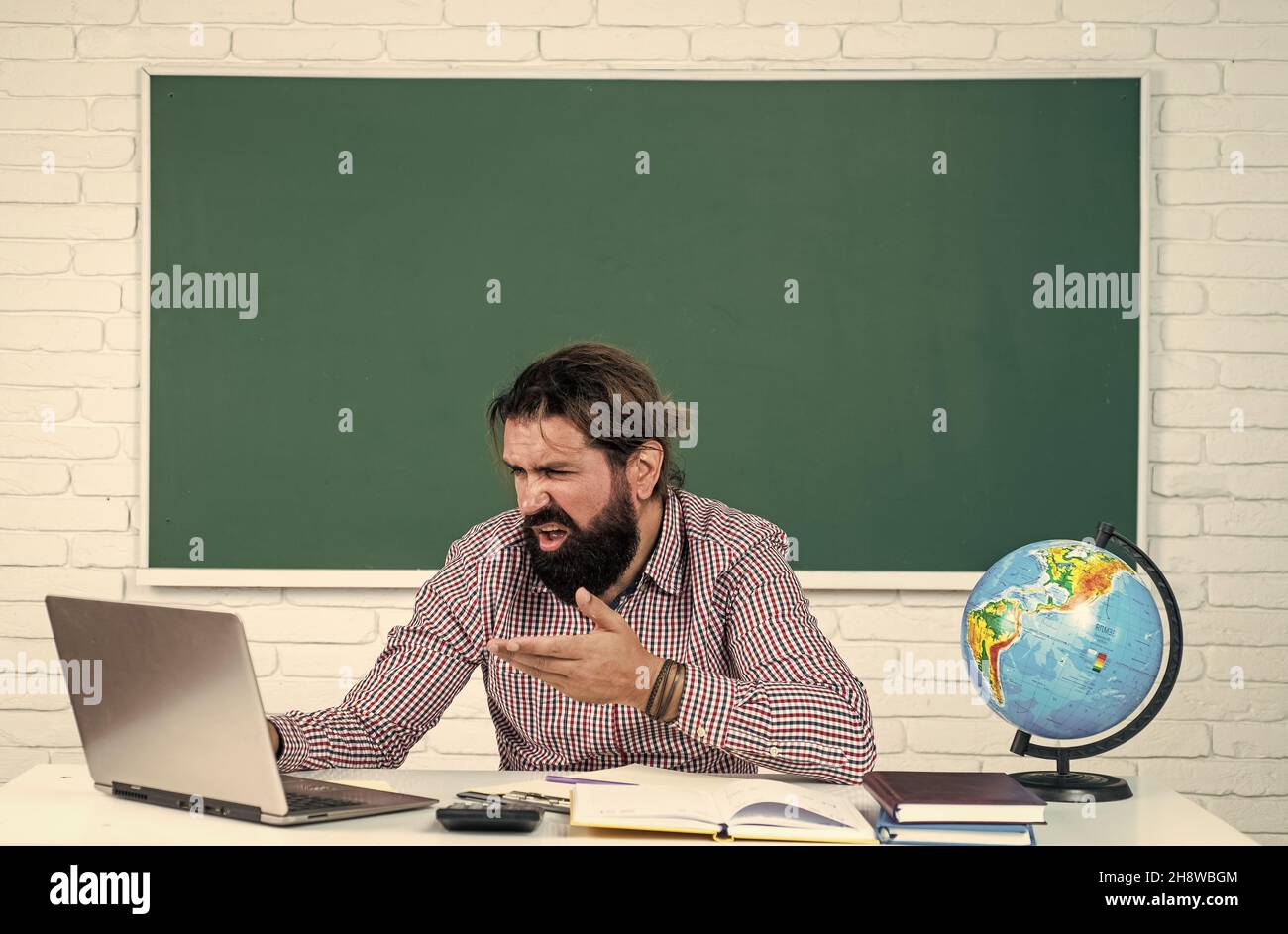 angry unhappy university student working on diploma project using ...