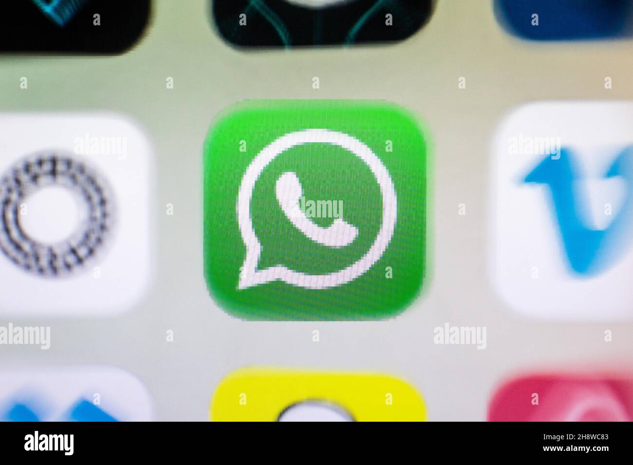 In this photo illustration a close-up of a WhatsApp app icon seen ...