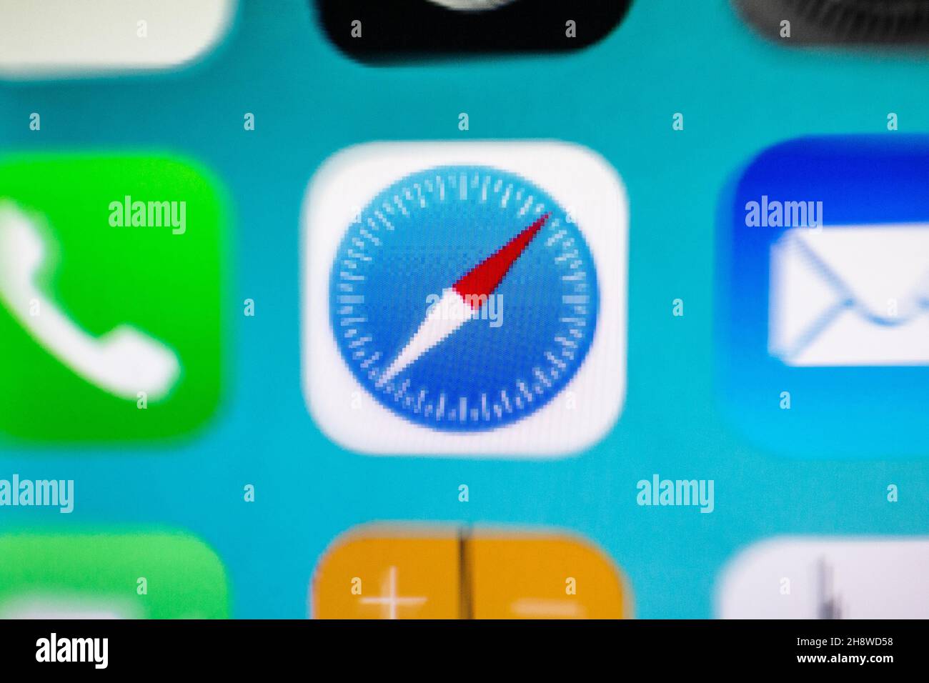 In this photo illustration a close-up of a Safari app icon seen ...