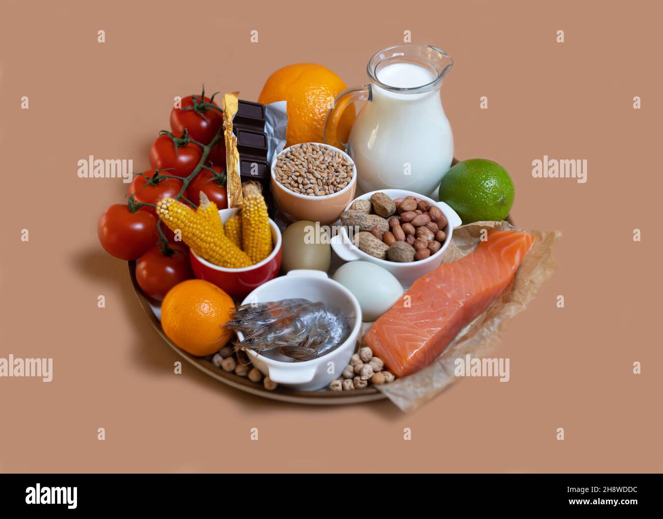 Elimination diet concept. Food allergens on plate - fish, seafood ...