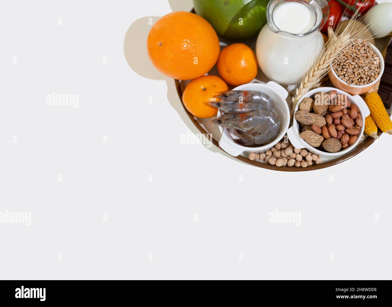 Elimination diet concept. Food allergens on plate - fish, seafood ...