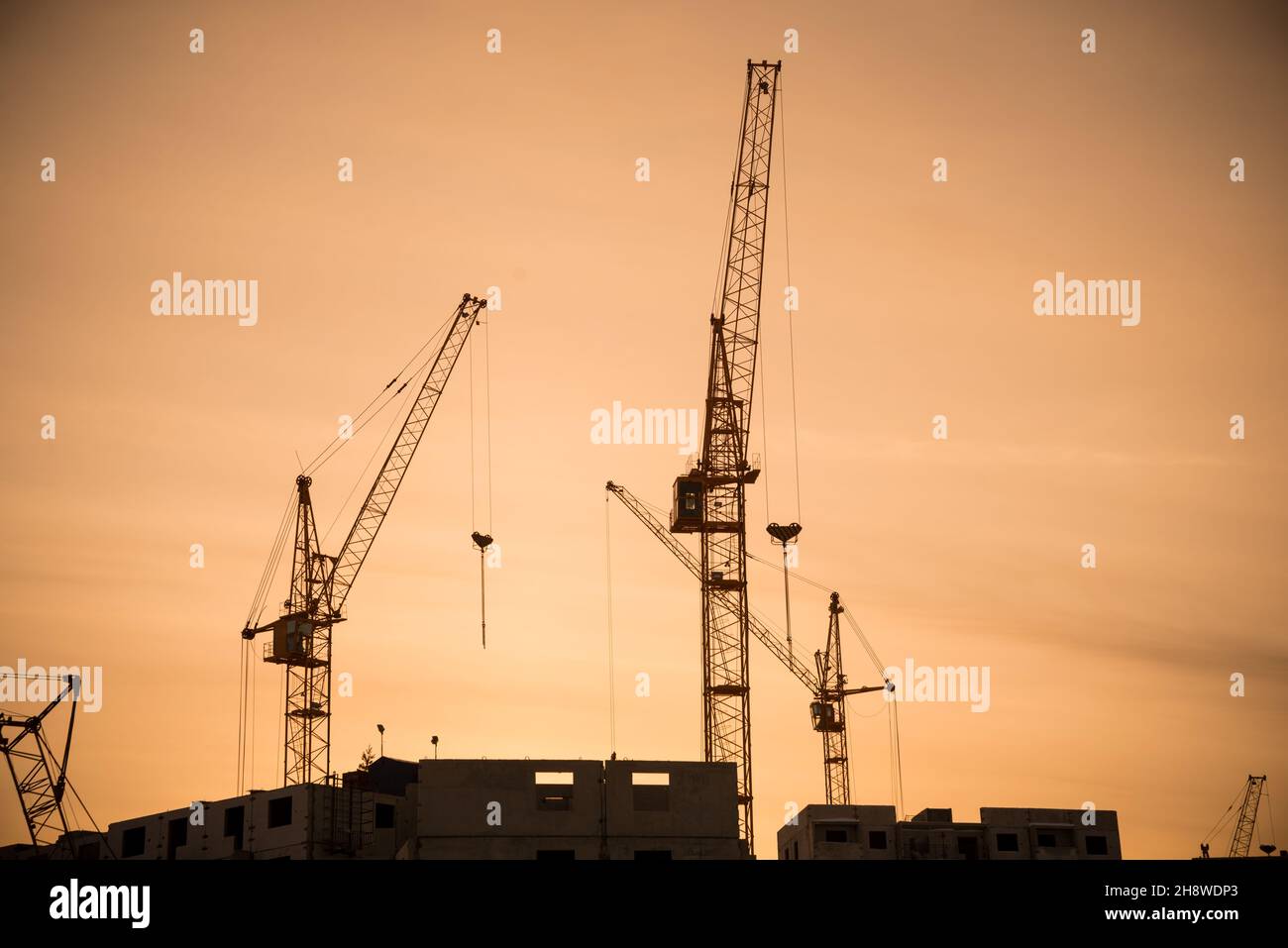 New residential high-rise buildings and column crane Stock Photo - Alamy