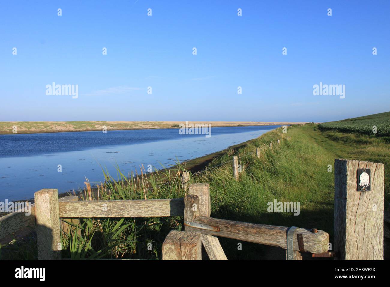 National trail acorn. Fleet Lagoon. The England south west coast path ...