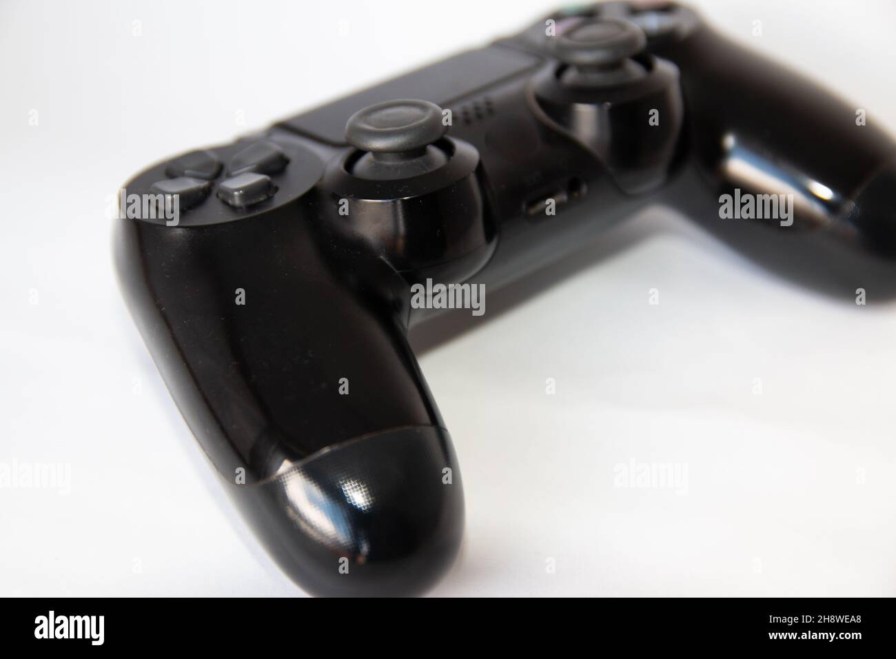 Closeup shot of a black joystick isolated on a white background Stock ...