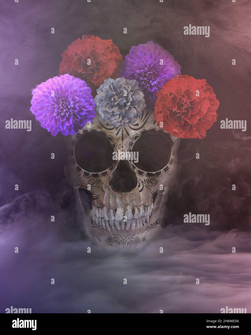 Vertical shot of a Calavera decorated with colorful flowers - sugar ...