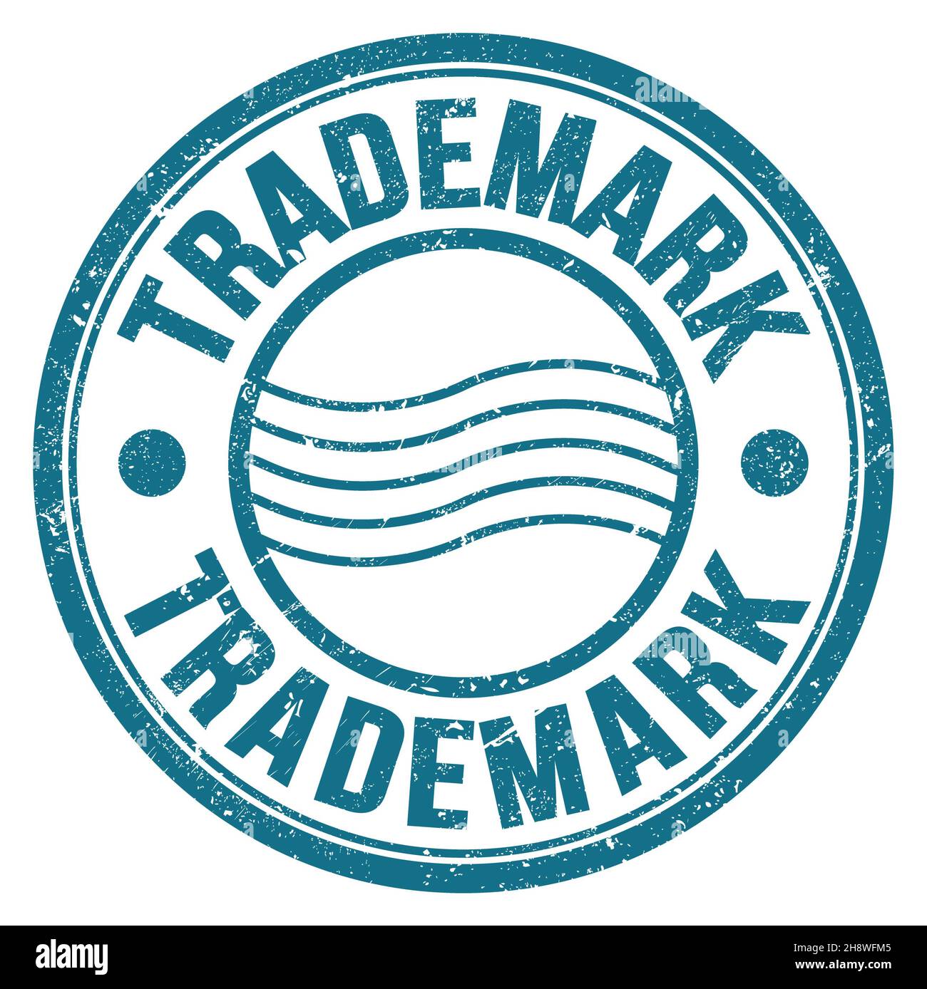TRADEMARK word written on blue round postal stamp sign Stock Photo - Alamy