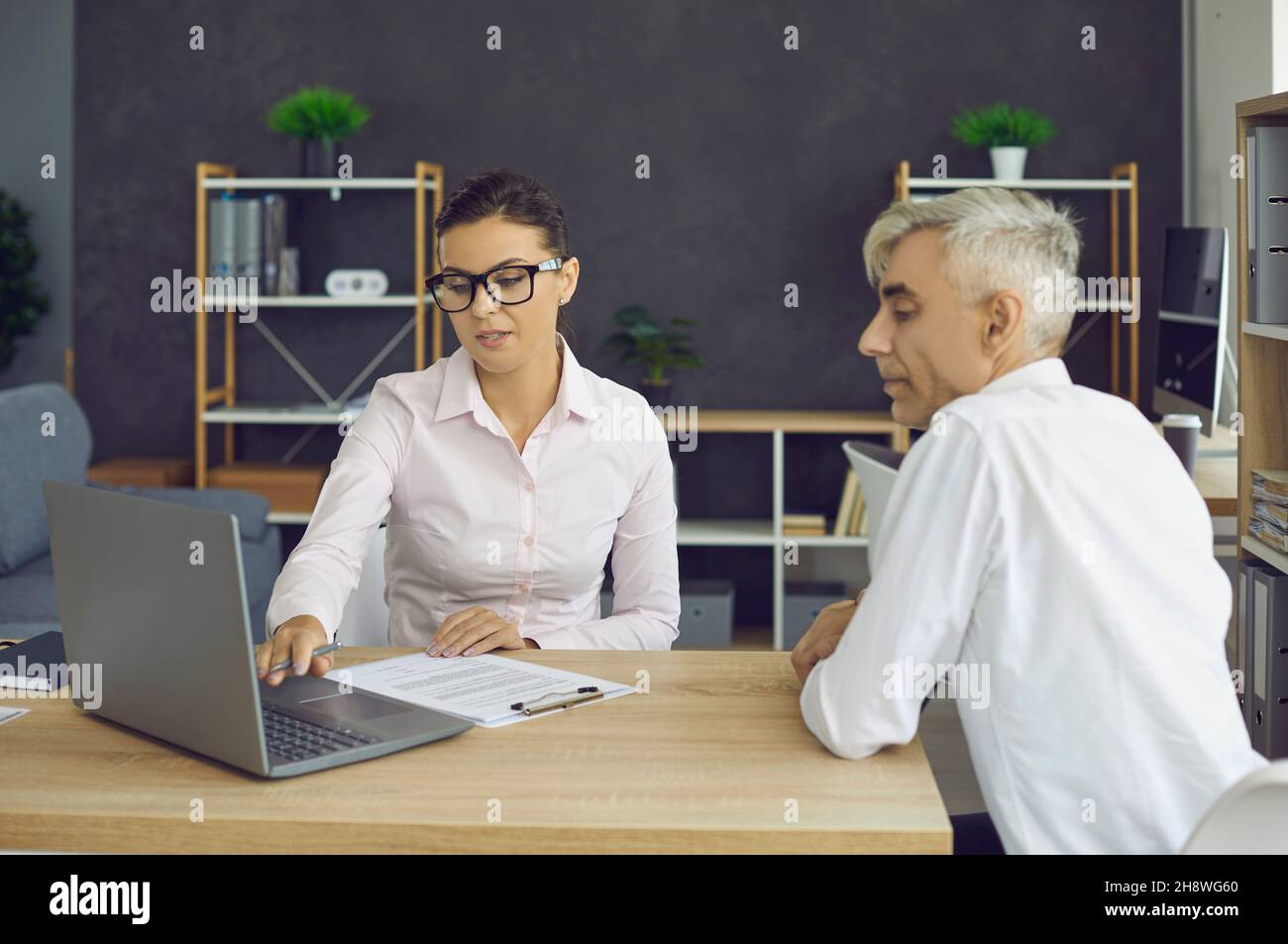 Manager employee talking woman hi-res stock photography and images - Alamy