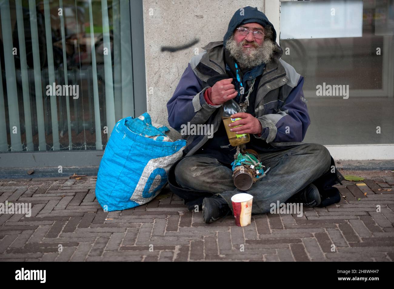 The Hague, Netherlands. Long time homeless alcoholic sitting in the ...