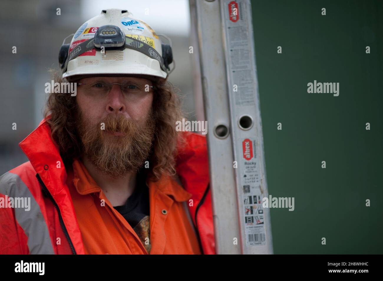 Rotterdam, Netherlands. Male, caucasian construction worker staring ...