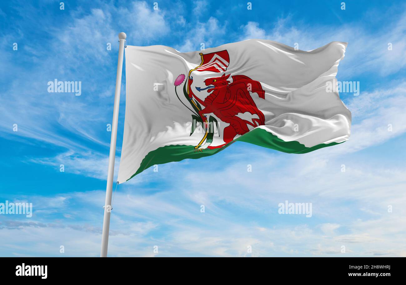 flag of Cardiff at cloudy sky background on sunset. panoramic view ...