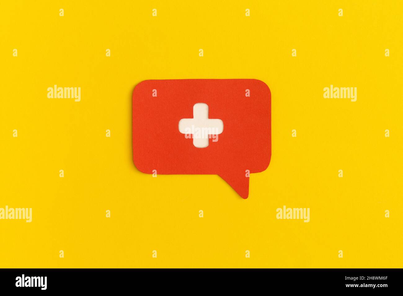 Medicine cross on a yellow background. Health and medical treatment ...