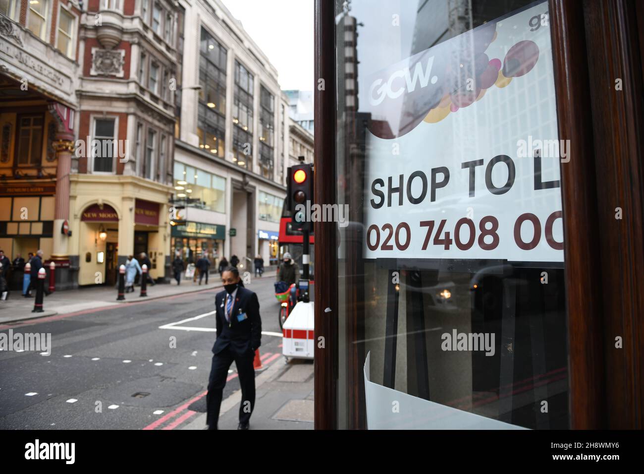 A shop to let sign is seen advertised in the window of an empty shop in ...