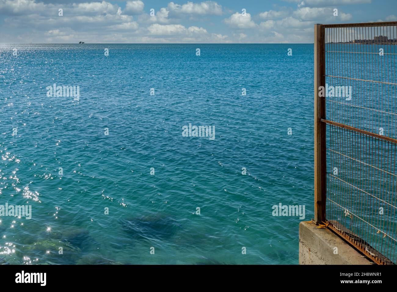 metal fence in the sea Stock Photo - Alamy