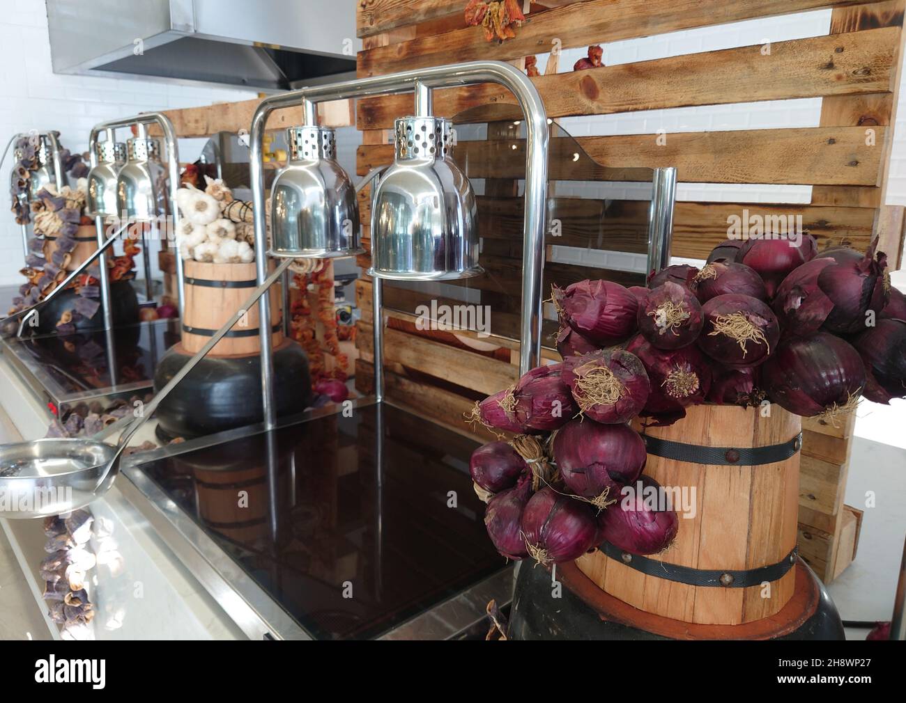 Interior of an upmarket restaurant with buffet counters with heated ...