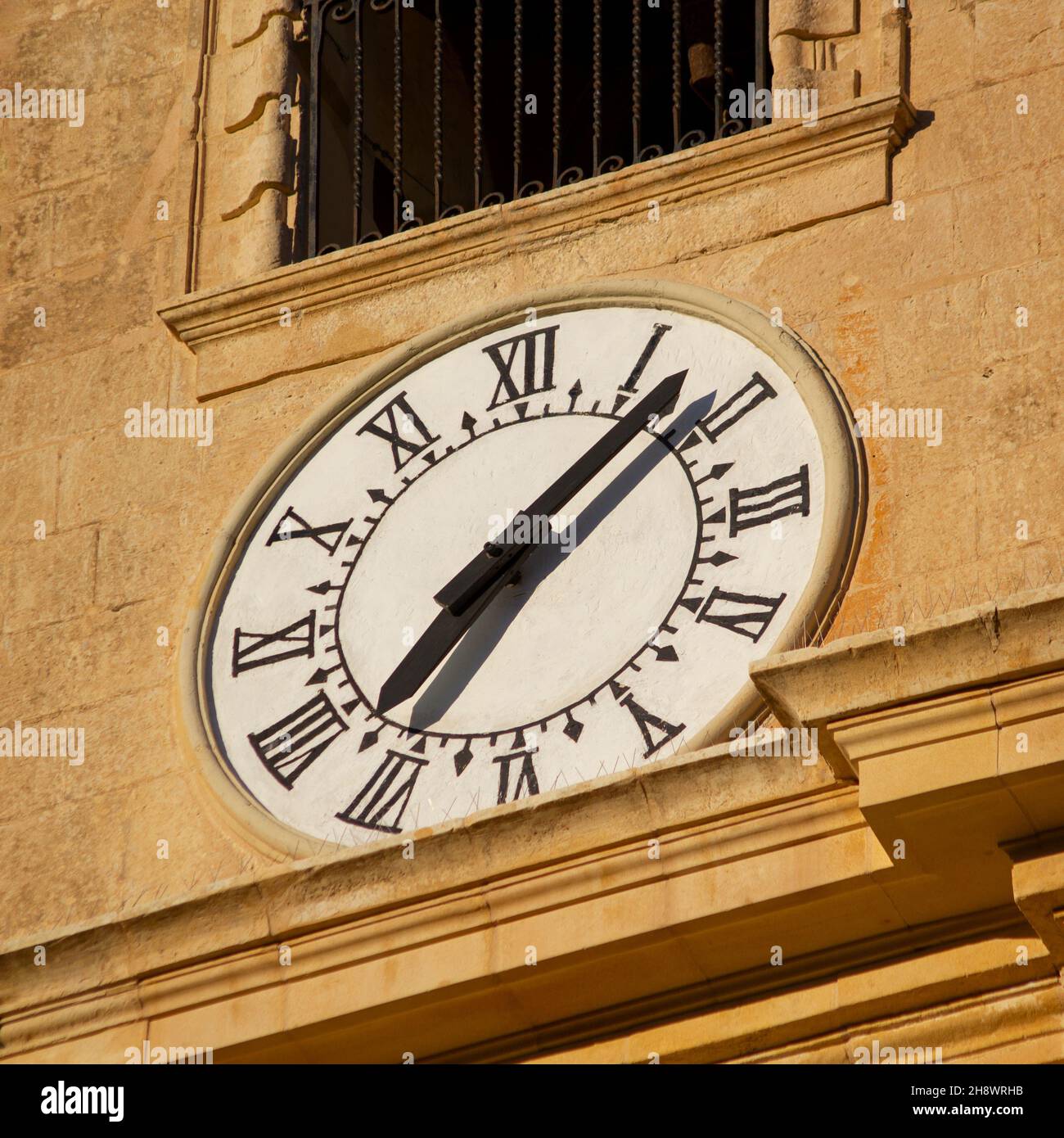 BALZAN, MALTA - May 09, 2021: The clock on the single belfry of the ...