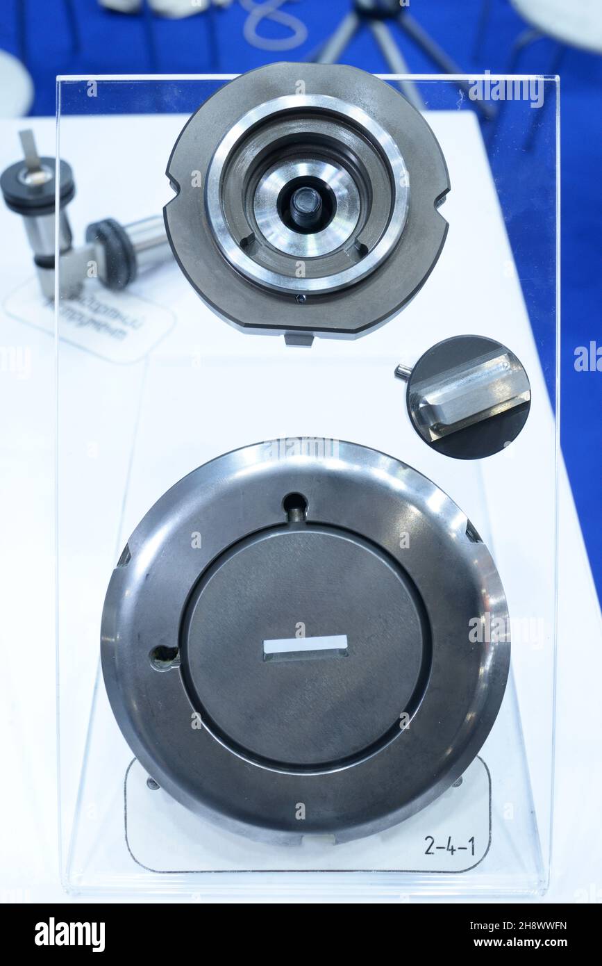 Punch press tooling and matrix placed on stand Stock Photo - Alamy