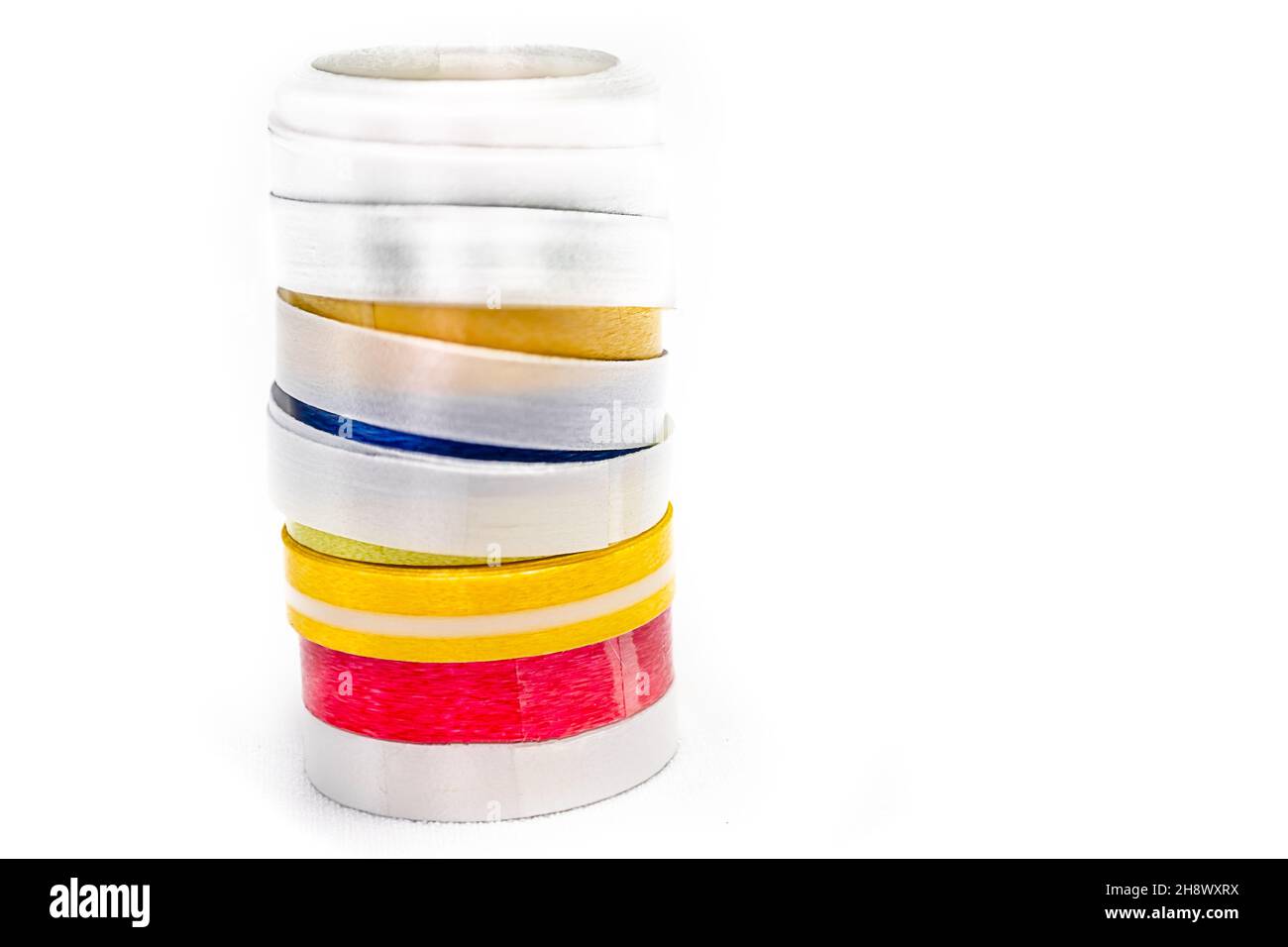 Multi-colored ribbons on a white background Stock Photo - Alamy