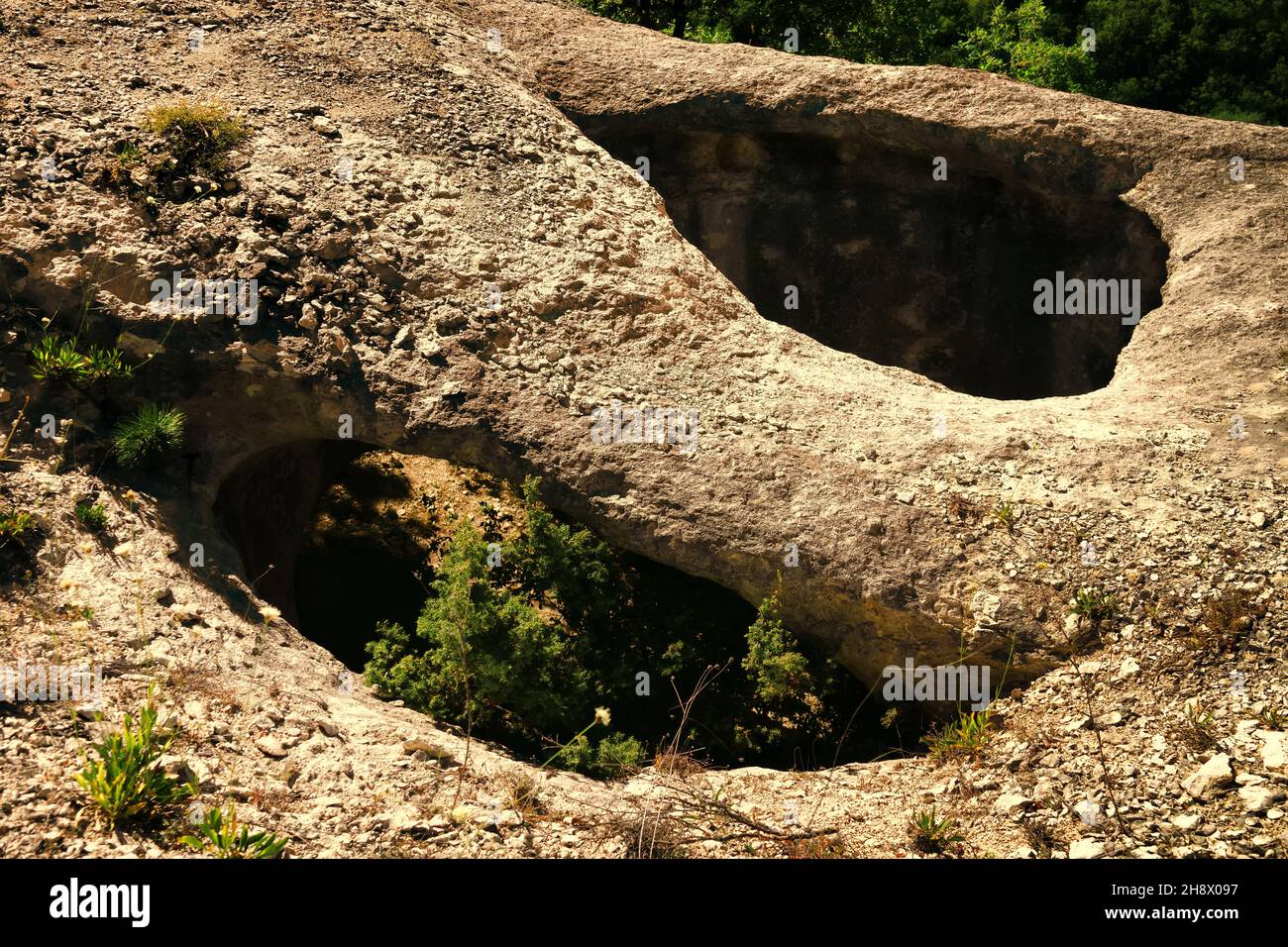 Cave-monastery, catacomb, crypt, sepulchre. The entrance to the dungeon ...