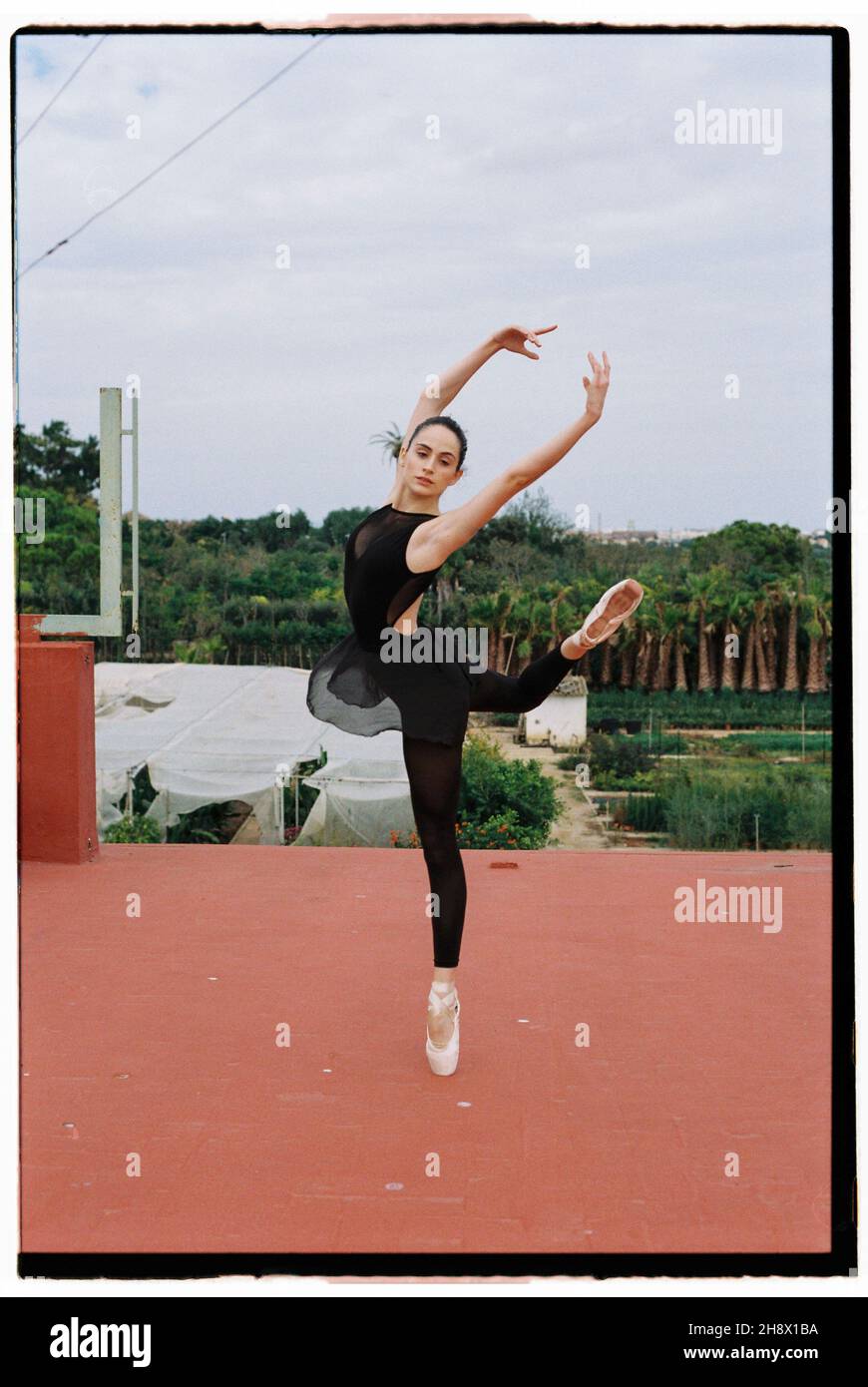 Ballerina in black leotard hi-res stock photography and images - Alamy