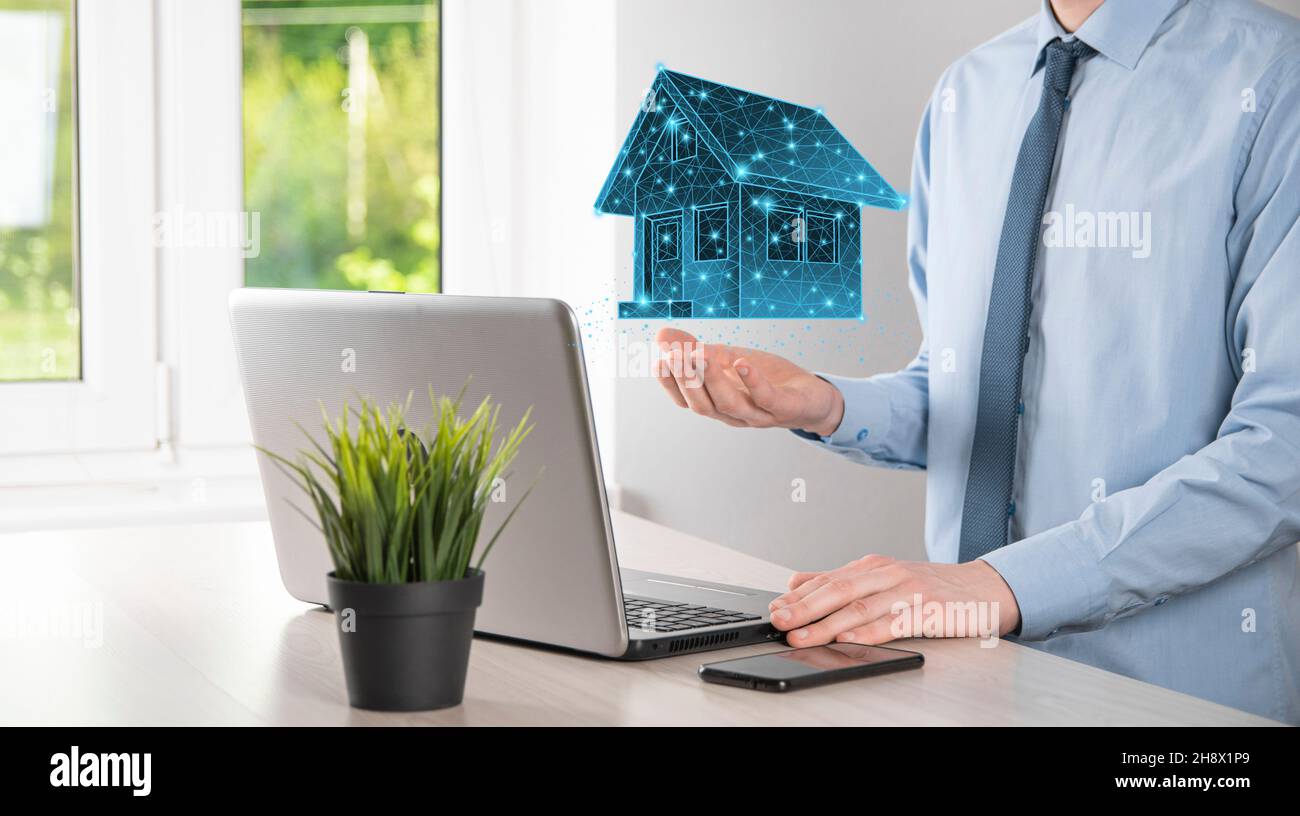 Man hold low polygon.Real estate concept, businessman holding a house ...