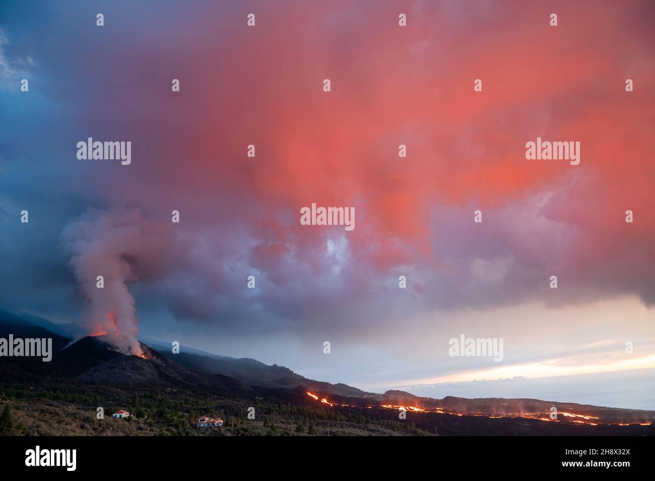 Breathtaking aerial view of mountain landscape with erupting Cumbre ...