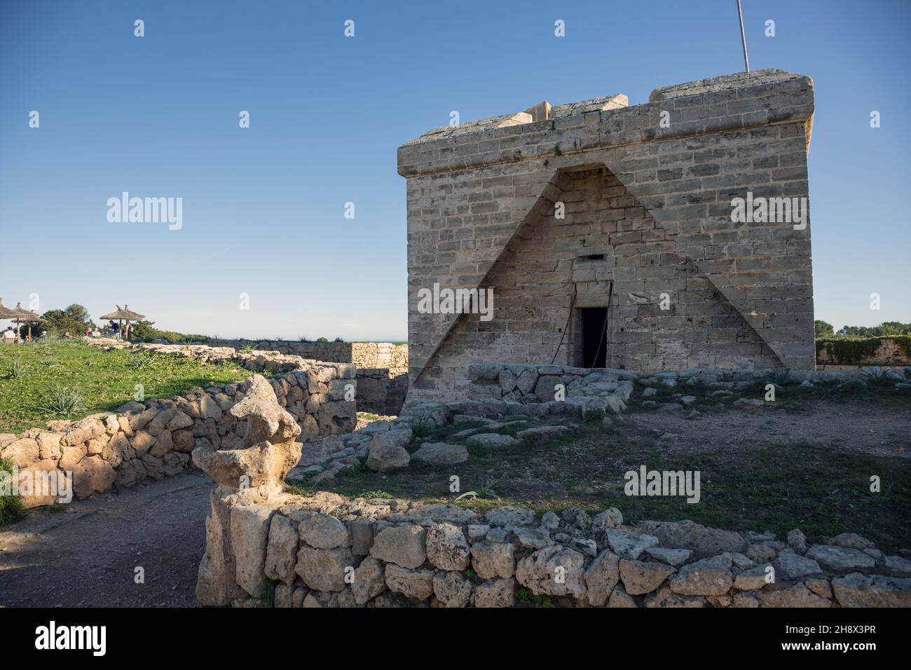 Small stone building under a clear blue sky outdoors Stock Photo - Alamy