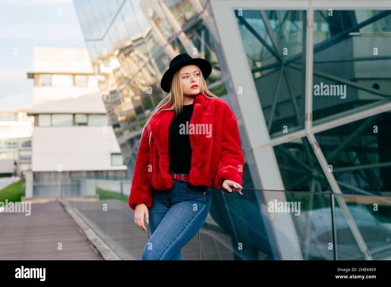Standing leaning looking away fashion model hat hi-res stock ...
