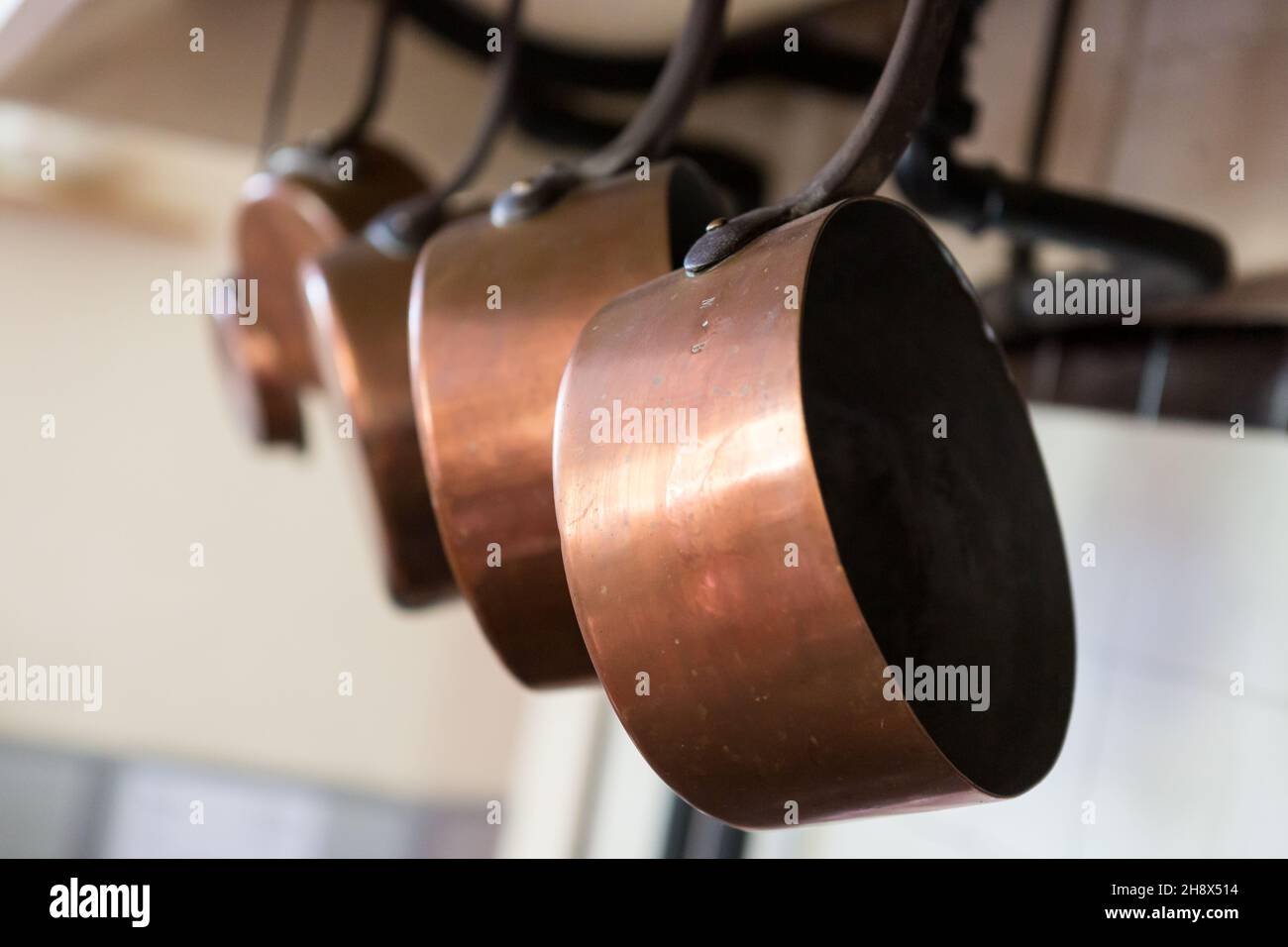 Hanging pans in kitchen hi-res stock photography and images - Alamy