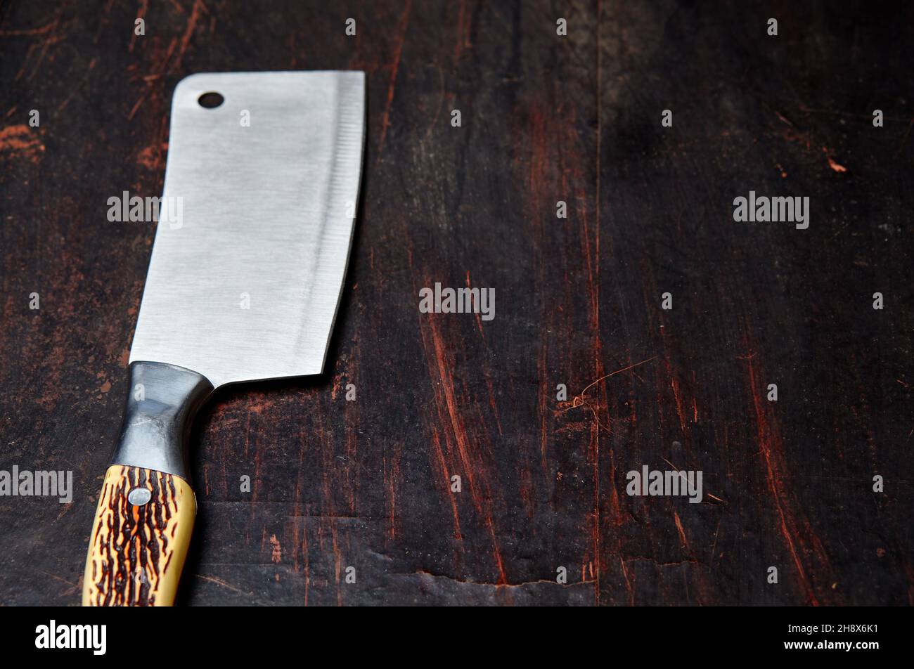 Meat cleaver on dark wooden background. Stainless steel Kitchen knife ...