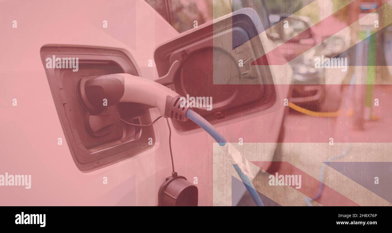 Close-up double exposure of charging plug plugged in electric vehicle ...