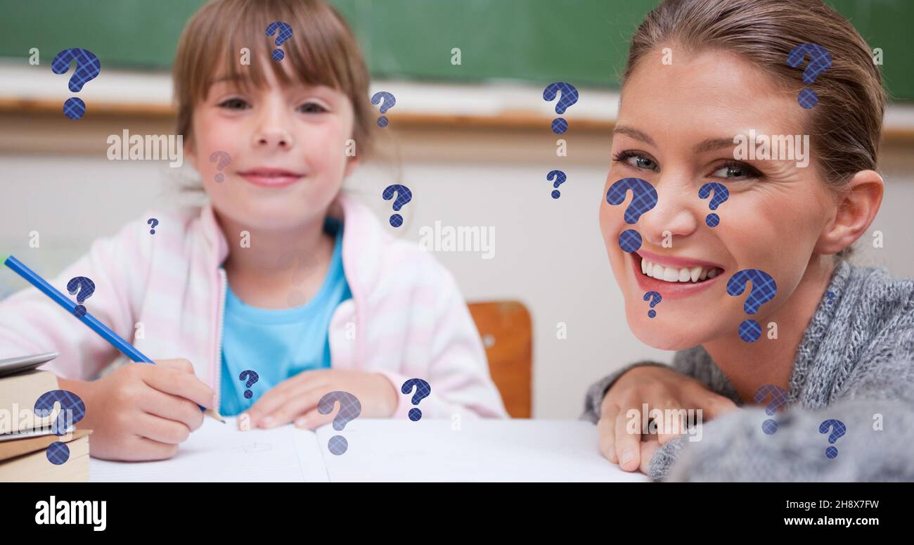 Digital composite of question marks over smiling schoolgirl and teacher ...