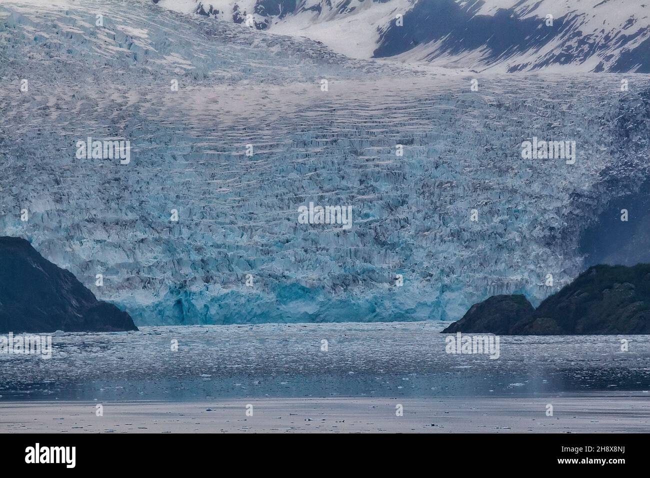 Blue Ice that forms a Glacier in the many fjords of Alaska Stock Photo ...
