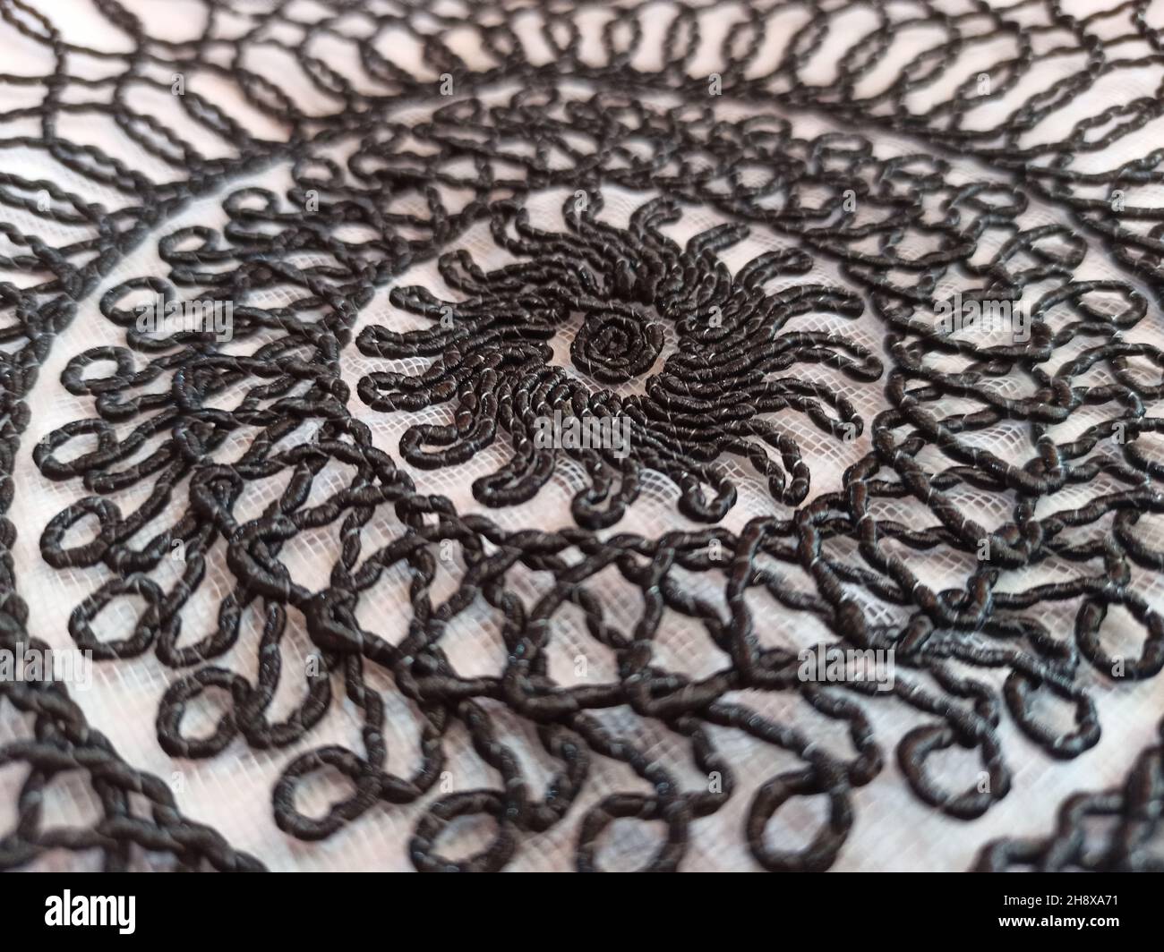 spiral pattern of an embroidery cloth Stock Photo - Alamy