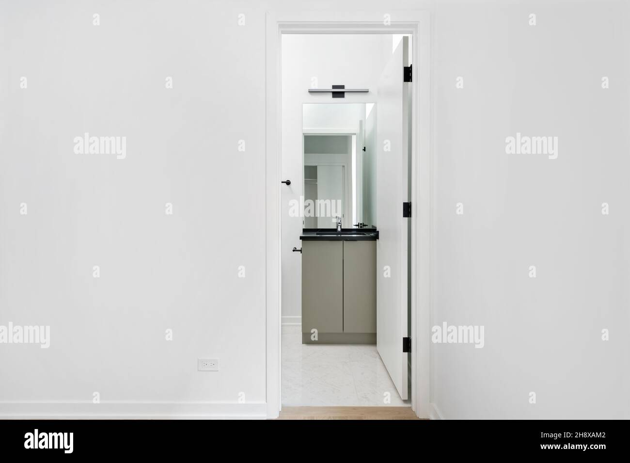 View into Modern White Bathroom with Green Vanity Negative Space Stock ...