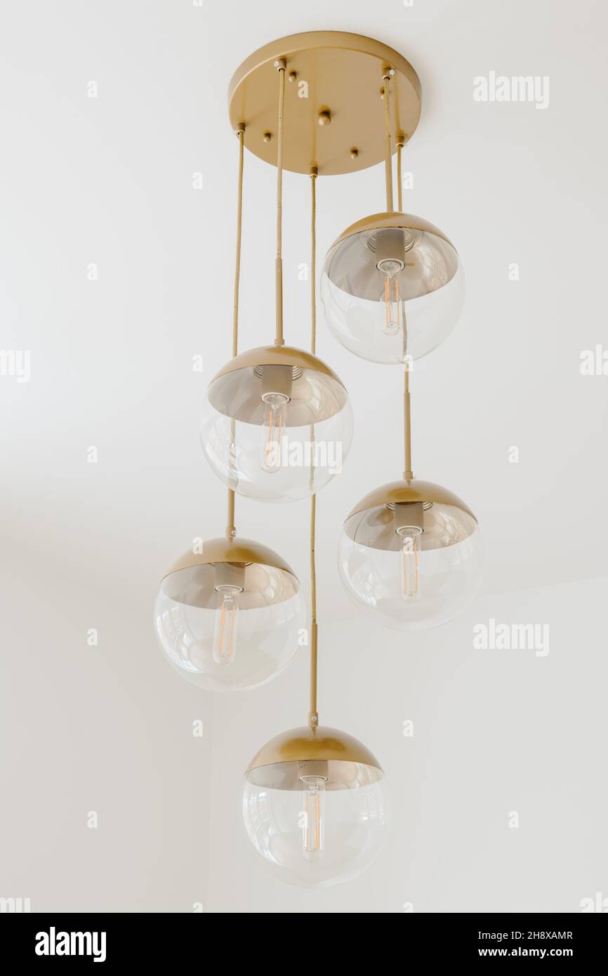 Modern Gold Chandelier Edison Bulb Light Fixture Against White Ceiling ...