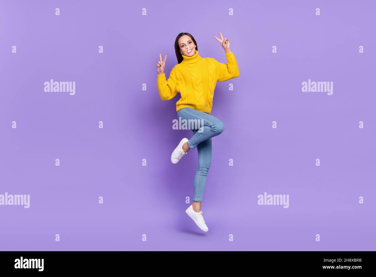 Full size photo of pretty jumping female showing v-sign wear casual ...