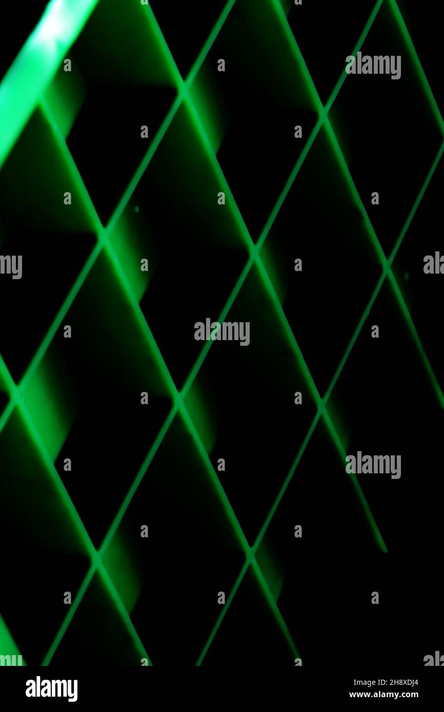 Vertical background or wallpaper of green rhombus shapes with shadows ...