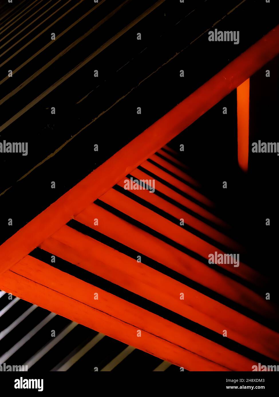 Vertical background or wallpaper of a hallway with shadows and sunlight ...