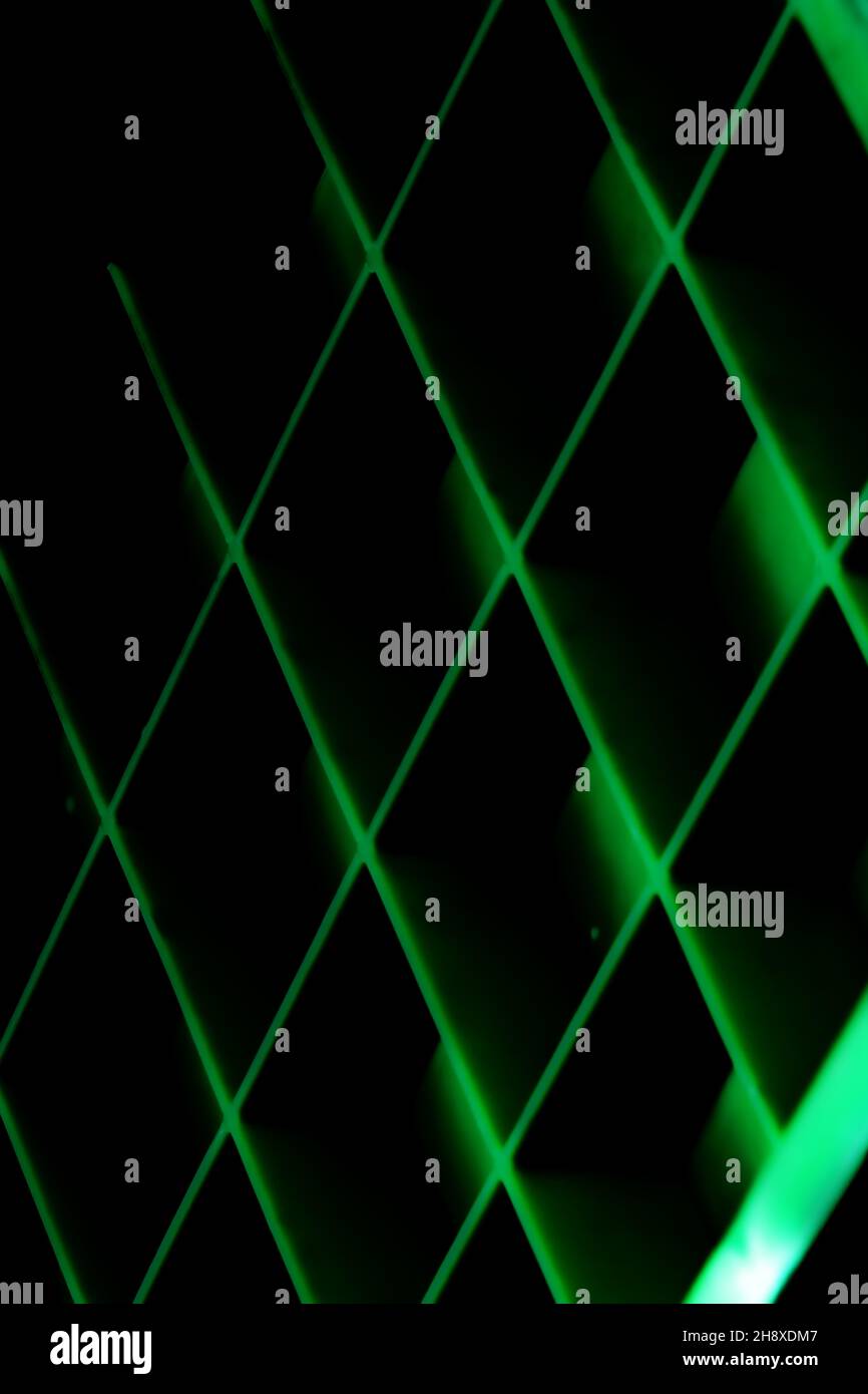 Vertical background or wallpaper of green rhombus shapes with shadows ...
