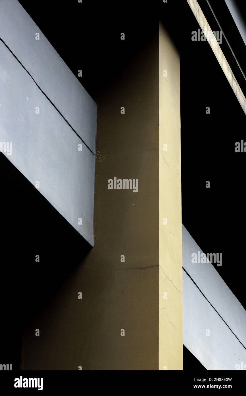 Architectural detail of a building with old weathered cracked column ...