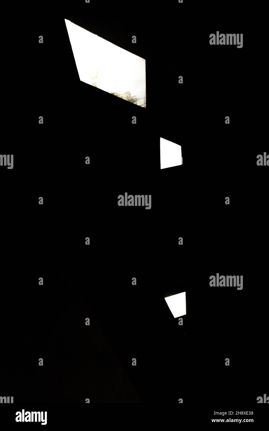 Vertical background or wallpaper of abstract shapes in the darkness ...