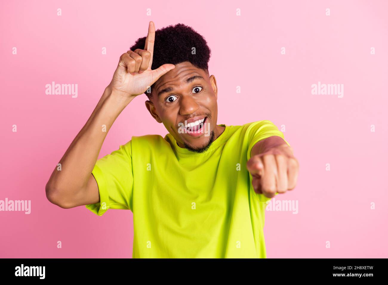 Photo of young african guy rude mocking bully point indicate finger you ...