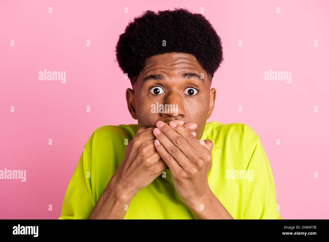 Portrait of attractive worried guy closing louth oops fail bad news ...