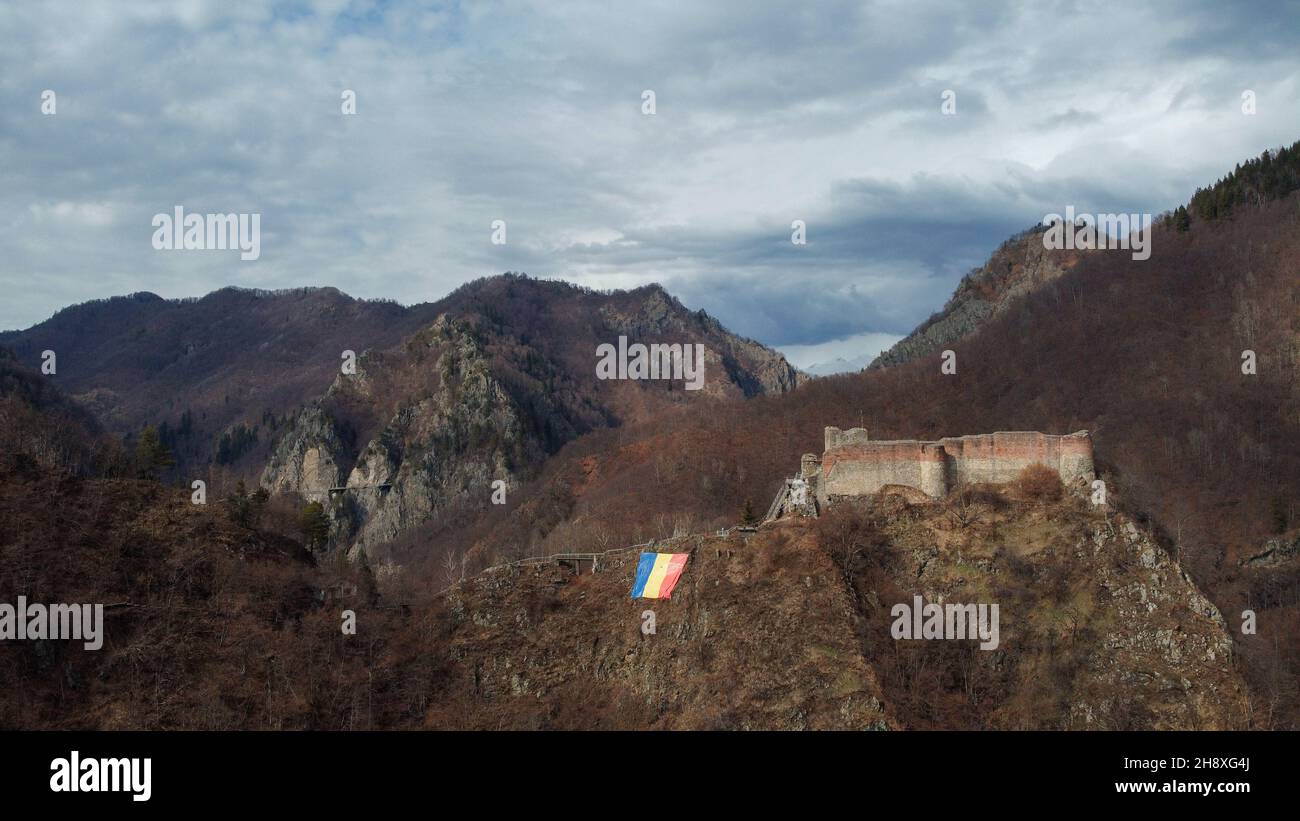 Poenari fortress in the Fagaras Mountains with a background of cloudy ...