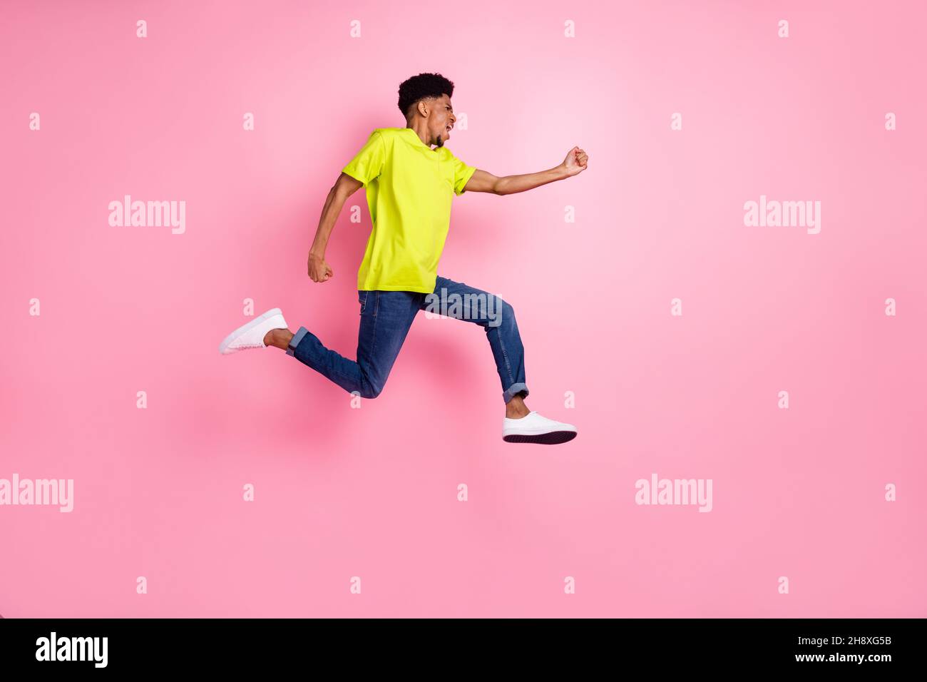 Full length body size profile side view of nice purposeful guy jumping ...