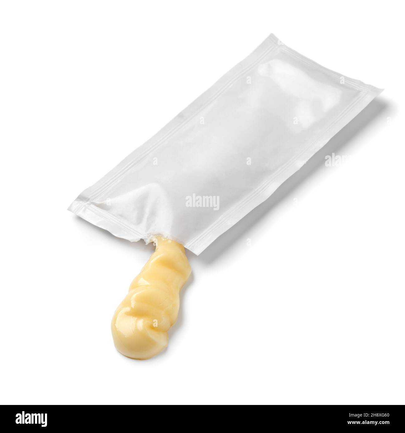 Mayonnaise from a disposible sachet isolated on white background Stock ...