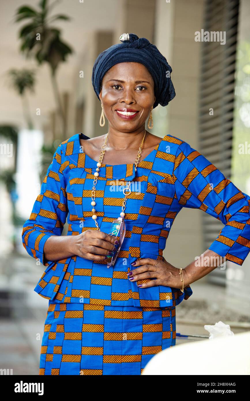 beautiful adult businesswoman wearing a traditional loincloth holding ...